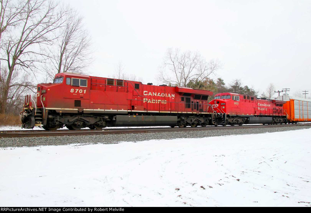 CP 8701 and sister 9622 with empty autoracks at CP382